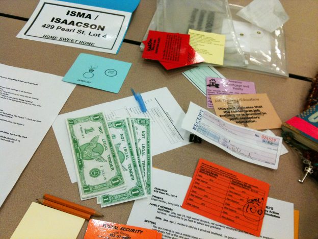 poverty-simulation-monopoly-money-game | CSRA EOA Inc.